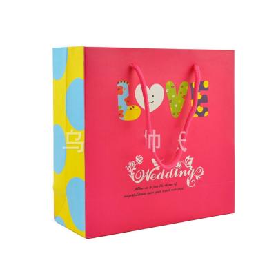 China premium ivory board wedding gift paper bags kids birthday present bags custom design accepted for sale