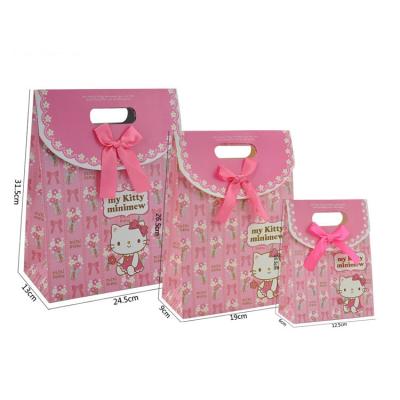 China Top folded design hello kitty paper material gift bags with die cut handle welcome custom full color printing for sale