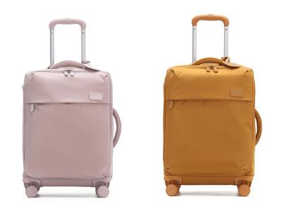 China Super Lightweight 2 Piece Soft Side Luggage Set Spinner Wheel Soft Shell Suitcase for sale