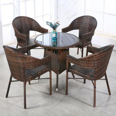 China Custom Logo Geweven PE Rattan Eettafel en Stoelen voor Hotel Outdoor Patio fauteuil Set Te koop