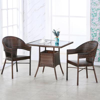 China Custom Logo Geweven PE Rattan Eettafel en Stoelen voor Hotel Outdoor Patio fauteuil Set Te koop