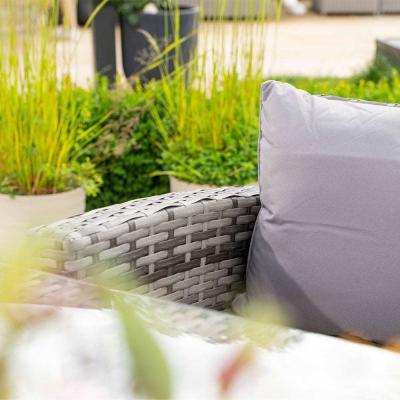 China Add Elegance to Your Garden with AJUNION Wicker Woven Sofa Set and Fire Pit Table for sale