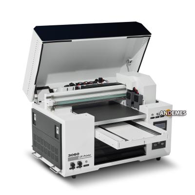 China Máquina de impressão digital UV direta versátil Roll To Roll Xp600 Função de verniz da cabeça de impressão à venda