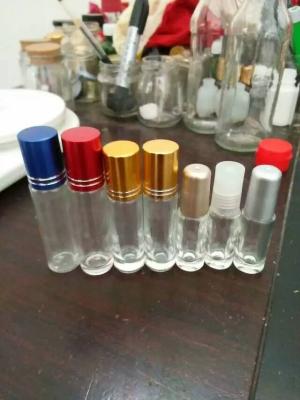 China Glass bottle,5-10 ml Glass bottle with lid customer shapes and logos welcome for sale