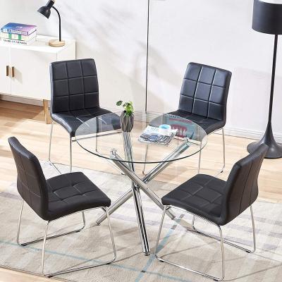China 4 Seater Tempered Glass Dining Table Black Metal Legs For Restaurant for sale