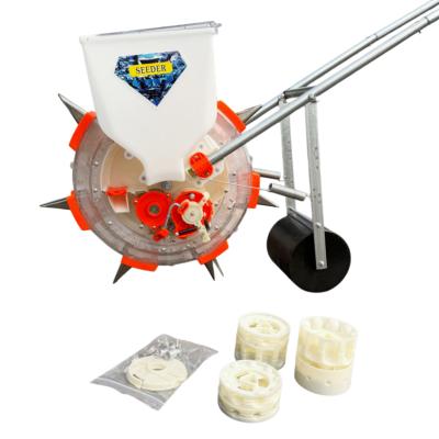 China Heavy-Duty Manual Seeder Machine with Powder-Coated Finish and Large-Diameter Drive Wheel for Hard Soil for sale