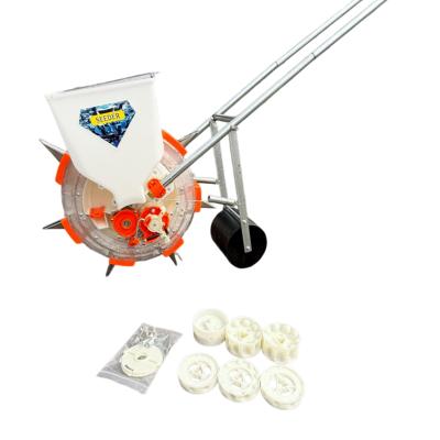 China Manual Seeder Machine Hand Push Sower Efficient Seed Planter For Farm Planting for sale