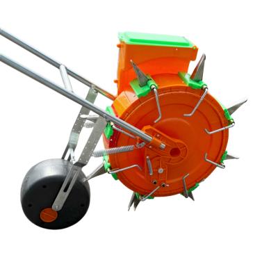 China Iron Manual Seeder Machine Hand Push Planter Tough Ground Sower Versatile for sale