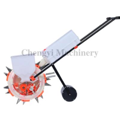 China Manual Seeder Machine With Fertilizing Hand Push Planter Sower Tool Precise Sowing for sale