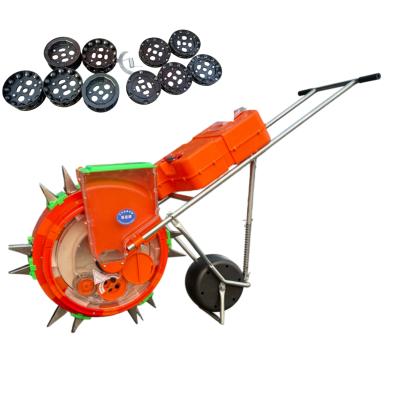 China Vegetables Hand Push Seeder With Fertilizer Applicator 12 Nozzle Adjustable for sale