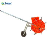 China Manual Seeder Machine Planter 7kg Seed Box Rust Resistant Efficient Farming Equipment for sale