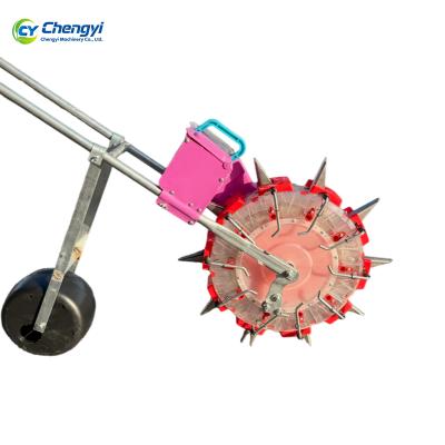 China Steel Manual Seeder Machine Hand Seeder Efficient Precision Planting Tool For Farming for sale