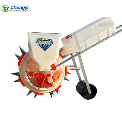 China Eco Friendly Plastic Manual Seeder Machine With Fertilization Lightweight Hand Planter for sale