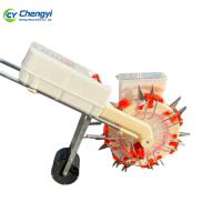 China Lightweight Manual Seeder Machine with Fertilization 14.5kg Hand Push Planter for Corn Soybean for sale