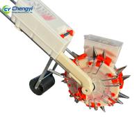 China Lightweight Manual Seeder Machine with Fertilization 14.5kg Hand Push Planter for Corn Soybean for sale