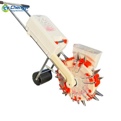 China Manual Seeder Machine with Fertilization Reliable Hand Planter for sale