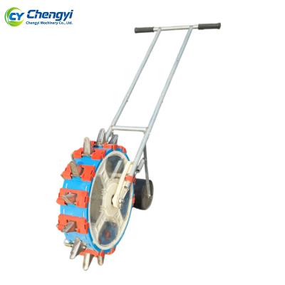 China Manual Seeder Machine Efficient Hand Planter for Precision Row Planting for sale