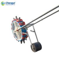 China Plastic Manual Seeder Machine Adjustable Depth 7kg Seed Box Ergonomic Vegetable Seed Planter for sale