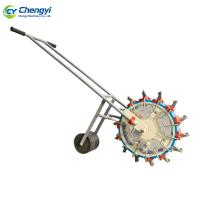 China Plastic Manual Seeder Machine Adjustable Depth 7kg Seed Box Ergonomic Vegetable Seed Planter for sale
