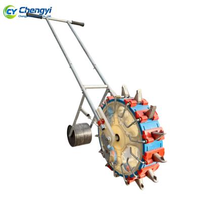 China Hand Push Seeder for Precise Sowing with Lightweight Design and Uniform Seed Spacing for sale