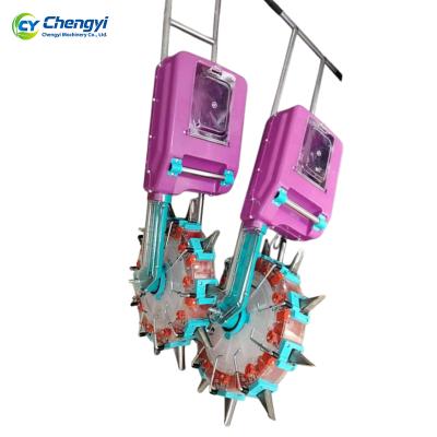 China Ergonomic Walk Behind Hand Push Fertilizer Spreader 1 Person Manual Sowing Machine for sale
