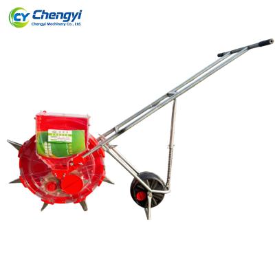 China Reinforced Metal Hand Push Seeder Sowing Tool Stable Efficient Planting For Farmland Garden for sale