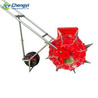 Quality Iron Manual Seeder Machine Push Planter Efficient Seed Sowing Equipment for for sale