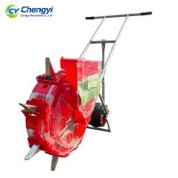 China Iron Manual Seeder Machine Hand Push Planter 7kg Seed Box Adjustable Spacing for sale