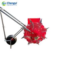 China Iron Manual Seeder Machine Hand Push Planter 7kg Seed Box Adjustable Spacing for sale