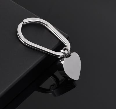 Cina Urna per la cremazione in acciaio inossidabile con la zampa stampata con la chiave del cuore per gioielli commemorativi e OEM/ODM in vendita