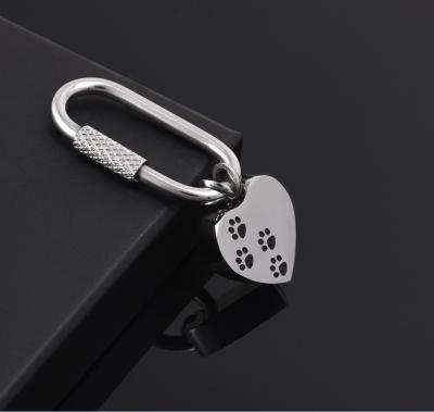 Cina Urna per la cremazione in acciaio inossidabile con la zampa stampata con la chiave del cuore per gioielli commemorativi e OEM/ODM in vendita