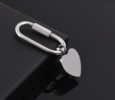 Cina Urna per la cremazione in acciaio inossidabile con la zampa stampata con la chiave del cuore per gioielli commemorativi e OEM/ODM in vendita