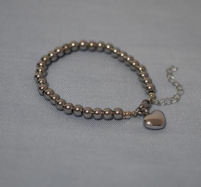 Cina OEM/ODM Polsetta di profumo a forma di cuore liscia Memoriale Braccialetto da donna in acciaio inossidabile in vendita