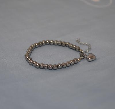 Cina OEM/ODM Polsetta di profumo a forma di cuore liscia Memoriale Braccialetto da donna in acciaio inossidabile in vendita