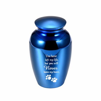 Cina Boccone di cremazione 70x45mm con disegno di zampa di cane inciso realizzato in lega di alluminio resistente in vendita