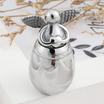 Cina Casseforti per animali domestici Urne base angelica Forma uovo cremazione ceneri commemorativi Urna pendente ricordo in vendita