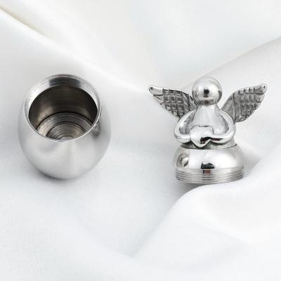 Cina Casseforti per animali domestici Urne base angelica Forma uovo cremazione ceneri commemorativi Urna pendente ricordo in vendita
