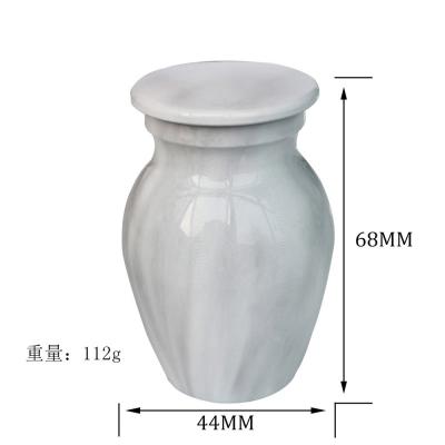 Cina OEM/ODM Urna di cremazione di granelli di marmo per ceneri umani e animali domestici 68*44mm 8 anni di esperienza in vendita