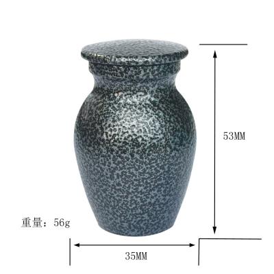 Cina Disegni unici Tessitura ghiacciata Urna in lega di alluminio per animali domestici Urna metallica 53*35mm Decorazione in vendita