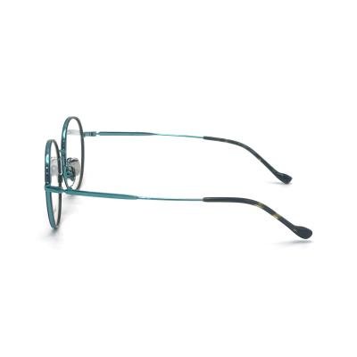 China TD055 Stylish Round Titanium Frame Glasses for Women - Durable and Lightweight for sale