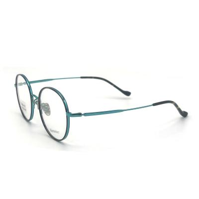China TD055 Stylish Round Titanium Frame Glasses for Women - Durable and Lightweight for sale