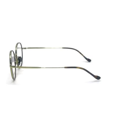 China TD055 Stylish Round Titanium Frame Glasses for Women - Durable and Lightweight for sale