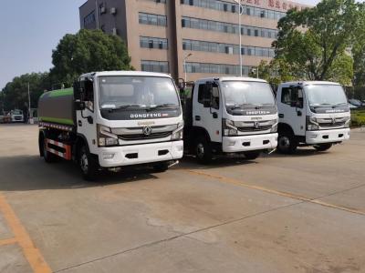 China 4X2 RHD DONGFENG camión de agua 6tons 6000L con cañón de agua en venta