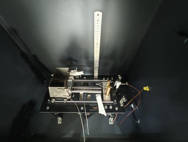 Close-up view of glow wire burner component