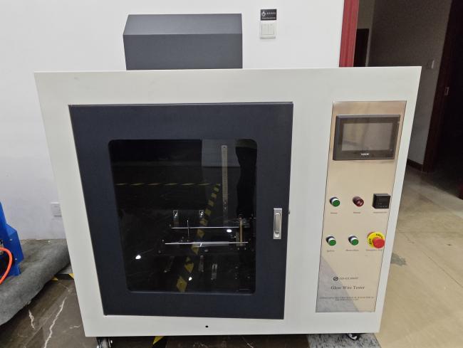 Glow wire tester machine performing flame combustion test