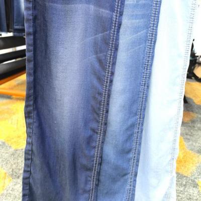 China Lightweight 4.5oz Pure Lyocell Plain Woven Denim Fabric  For Luxury Brands JSD2028 for sale