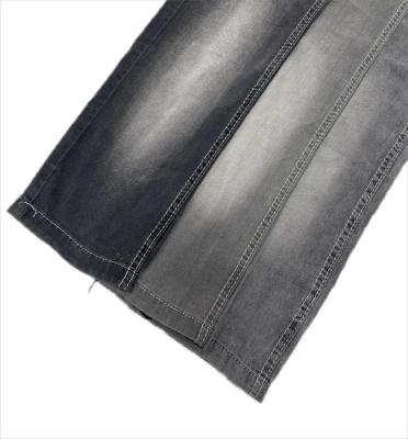 China Pattern YARN DYED Woven Black Color Summer Light Weight Slub Design Tencel Lyocell Elastic Denim Fabric for Jeans for sale