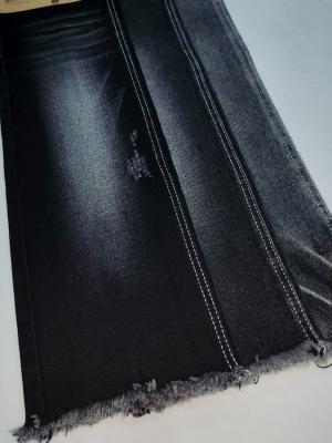Cina 74% Cotone NERO/NERO Tessuto Denim Twill elasticizzato, costruzione 8*10/70 per Jeans in vendita