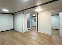 China 20ft Red Brick Pattern Expandable Container House 4.5m x 2.8m Fireproof Insulated for sale