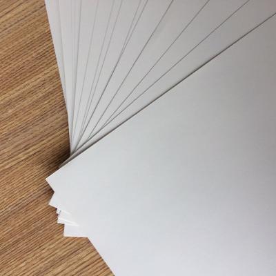 China Impressão offset Compatível Duplo Lado Revestido Branco C2S Papel de Arte Brilhante para Folhetos à venda